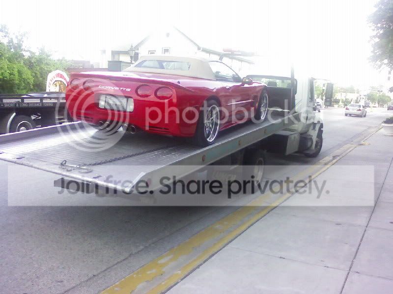 Where do you hook up to pull a C5 on to a flat bed tow truck ...