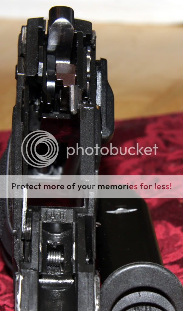 Please advise on how to complete reassemble slide and frame for uspc V1 ...